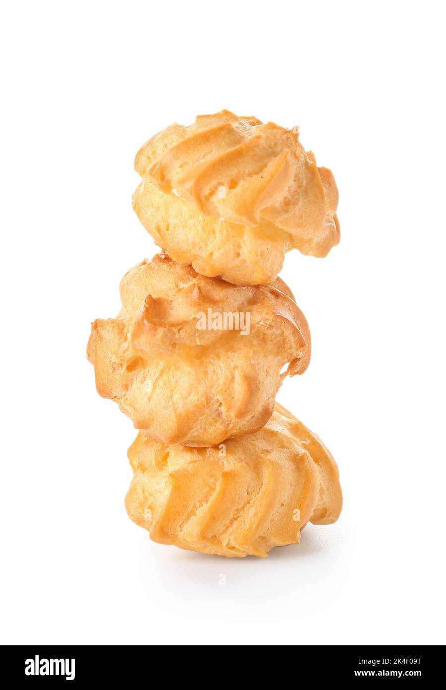 Tasty round eclairs on white background Stock Photo - Alamy