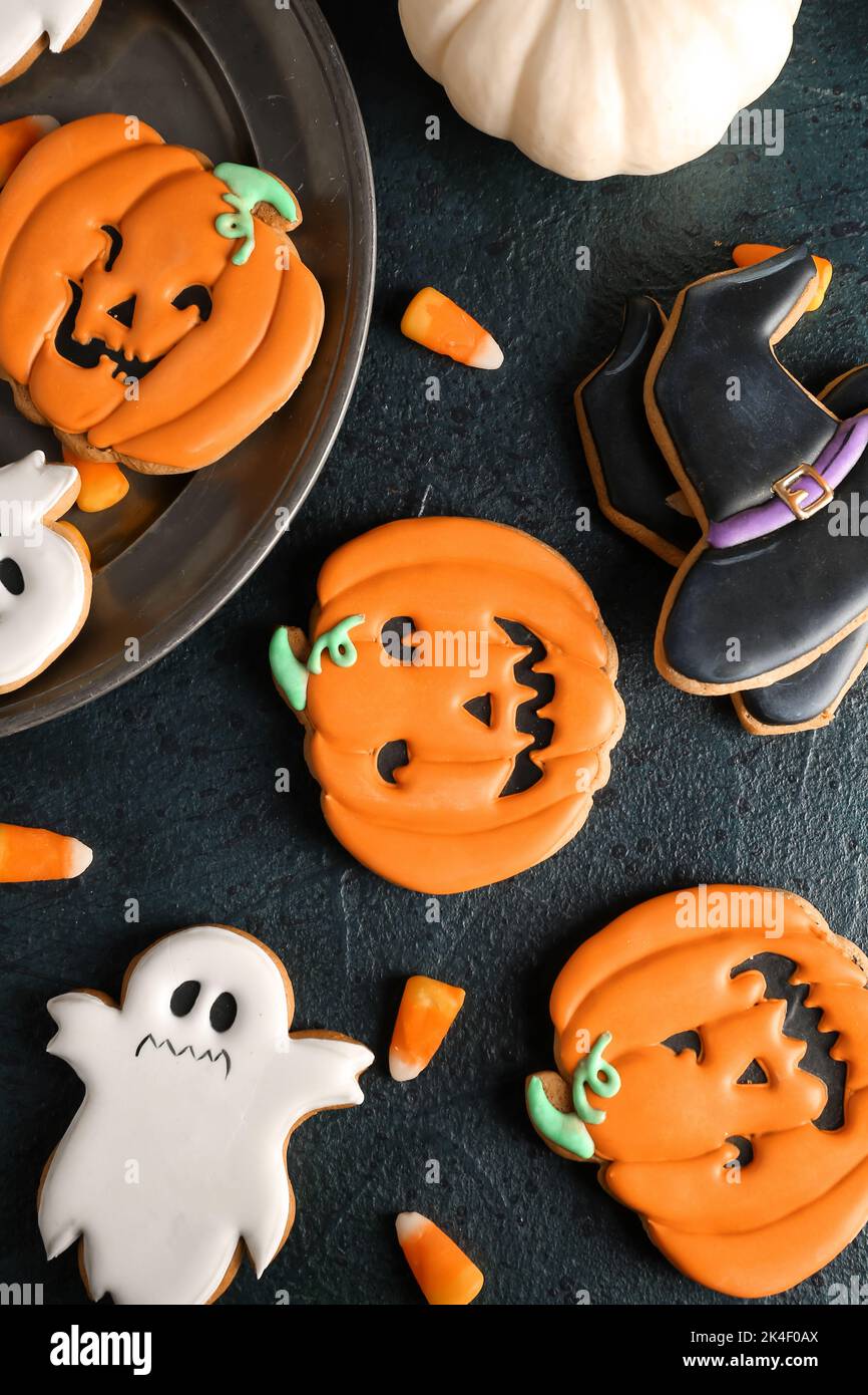 Halloween cookies and candy corns on dark background Stock Photo - Alamy
