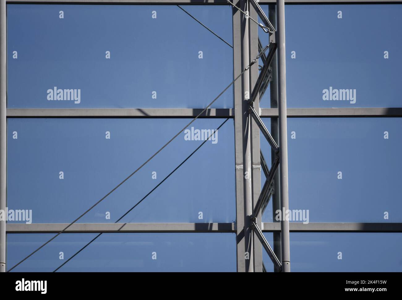 Window with metal and steel cable support Stock Photo - Alamy