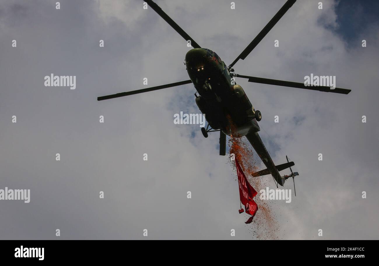 Kathmandu, Bagmati, Nepal. 2nd Oct, 2022. A Nepal Army helicopter pours ...