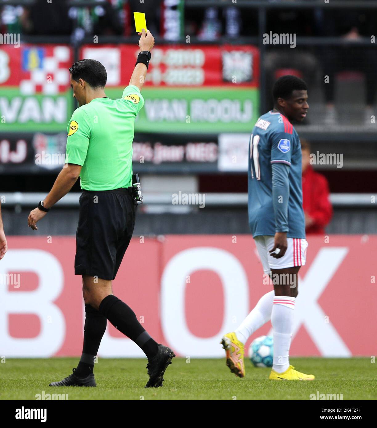 NIJMEGEN - Referee Serdar Gozubuyuk gives the yellow card to Javairo ...