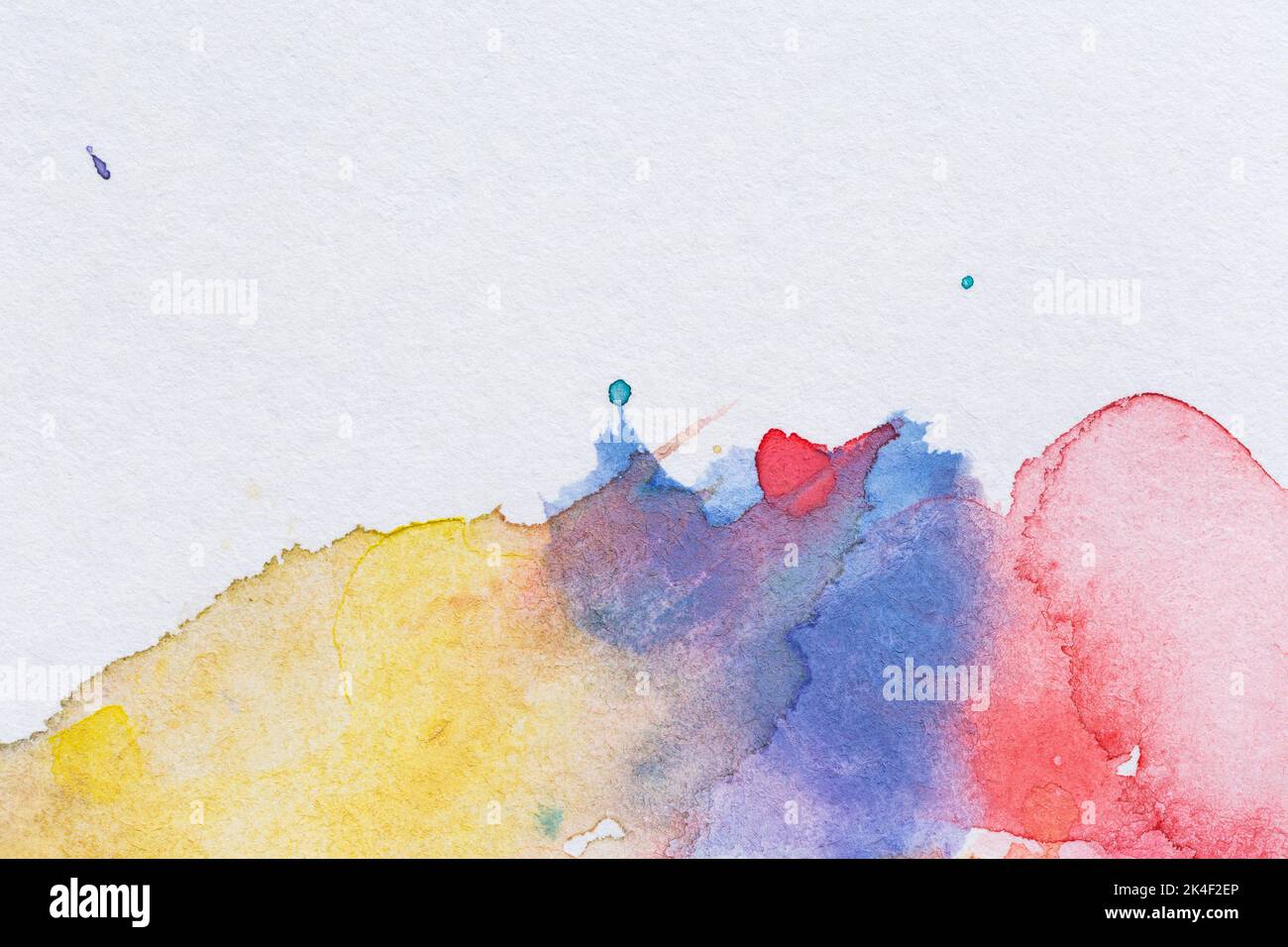 Macro close-up of abstract colorful watercolors with splashes ...