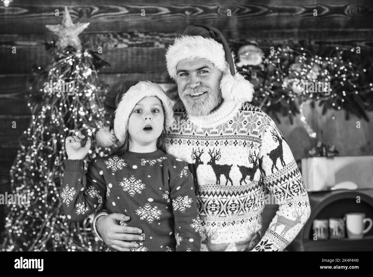 Winter holidays. My dear daughter. Father and little kid celebrate new ...