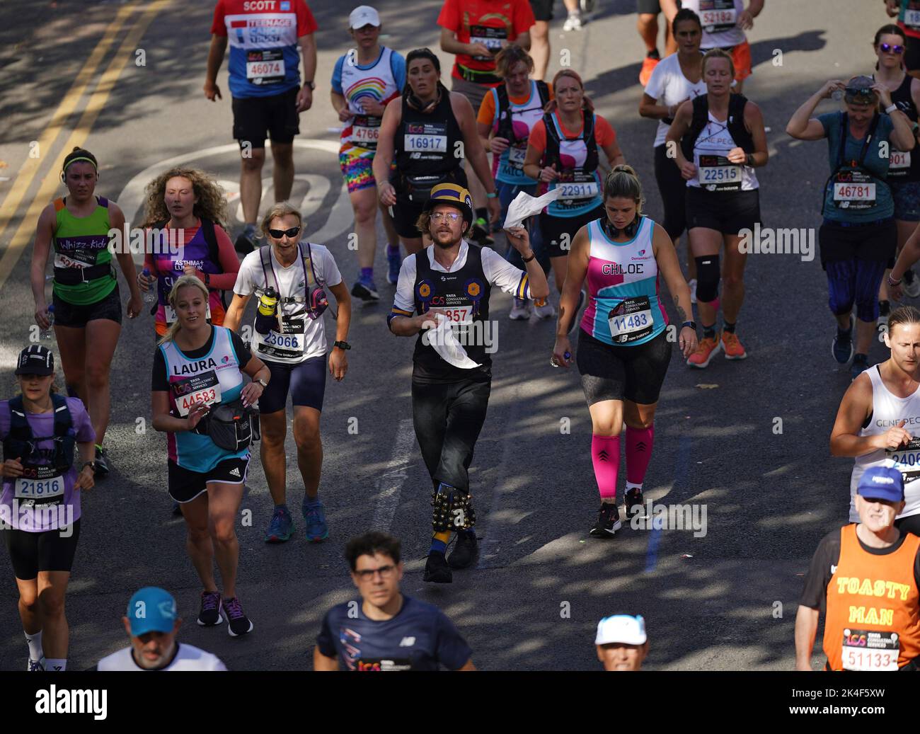 A runner dressed as a Morris dancer during the TCS London Marathon ...