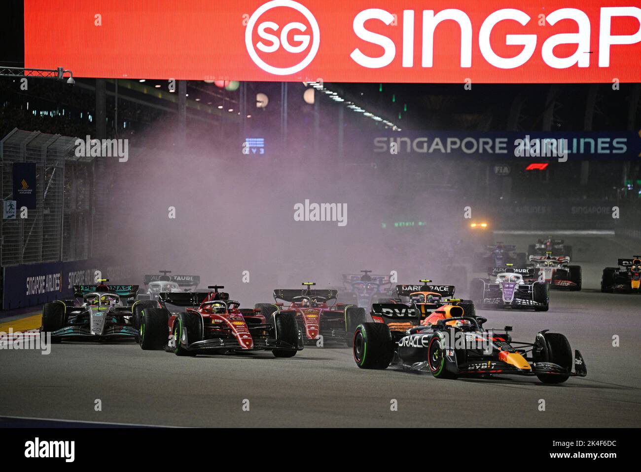 Singapore. 2nd Oct, 2022. Red Bull's Mexican driver Sergio Perez (1st R Front) drives during the ...