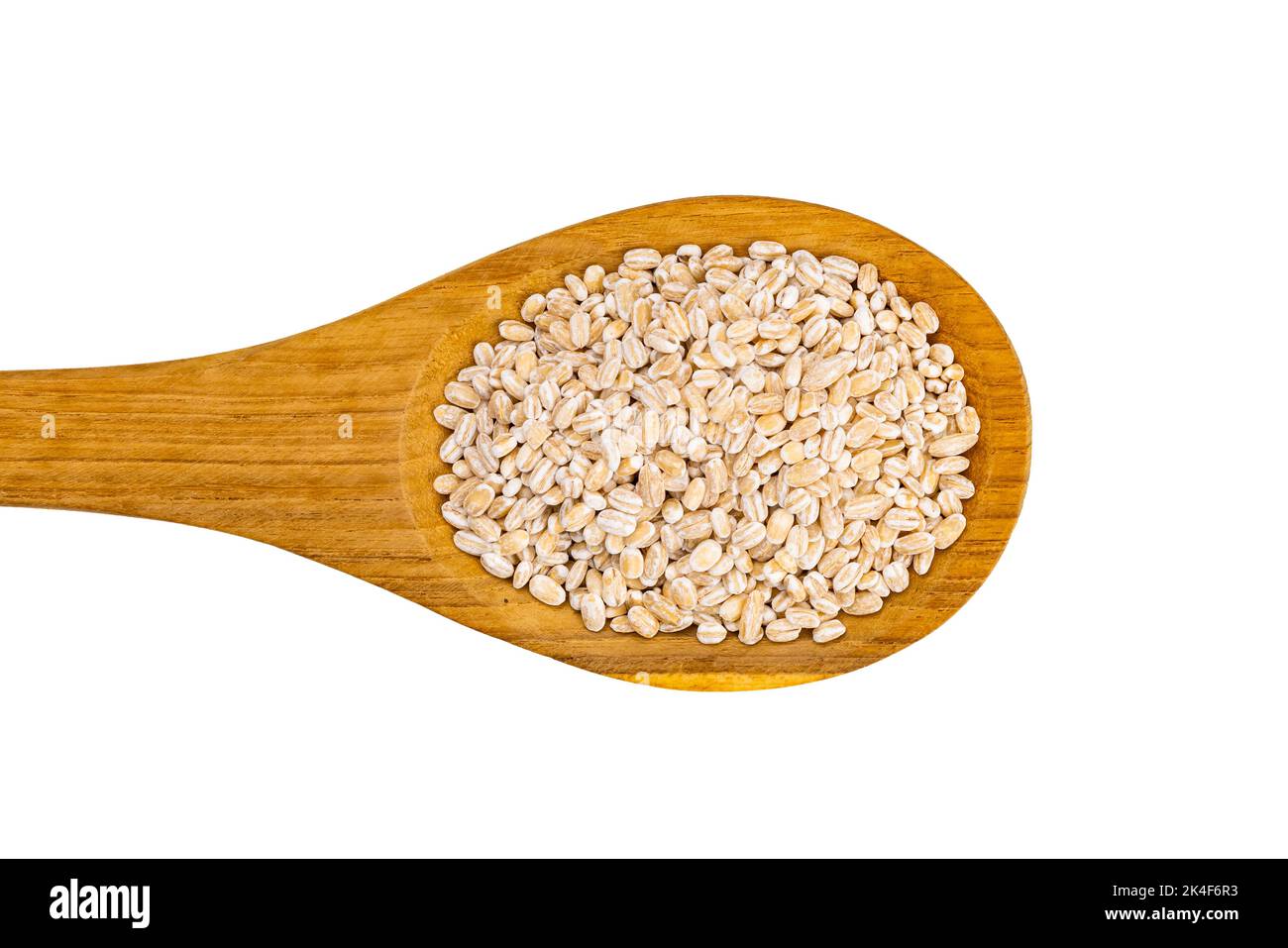 Top view or flat lay group of dry pearl barley in wooden spoon isolated ...