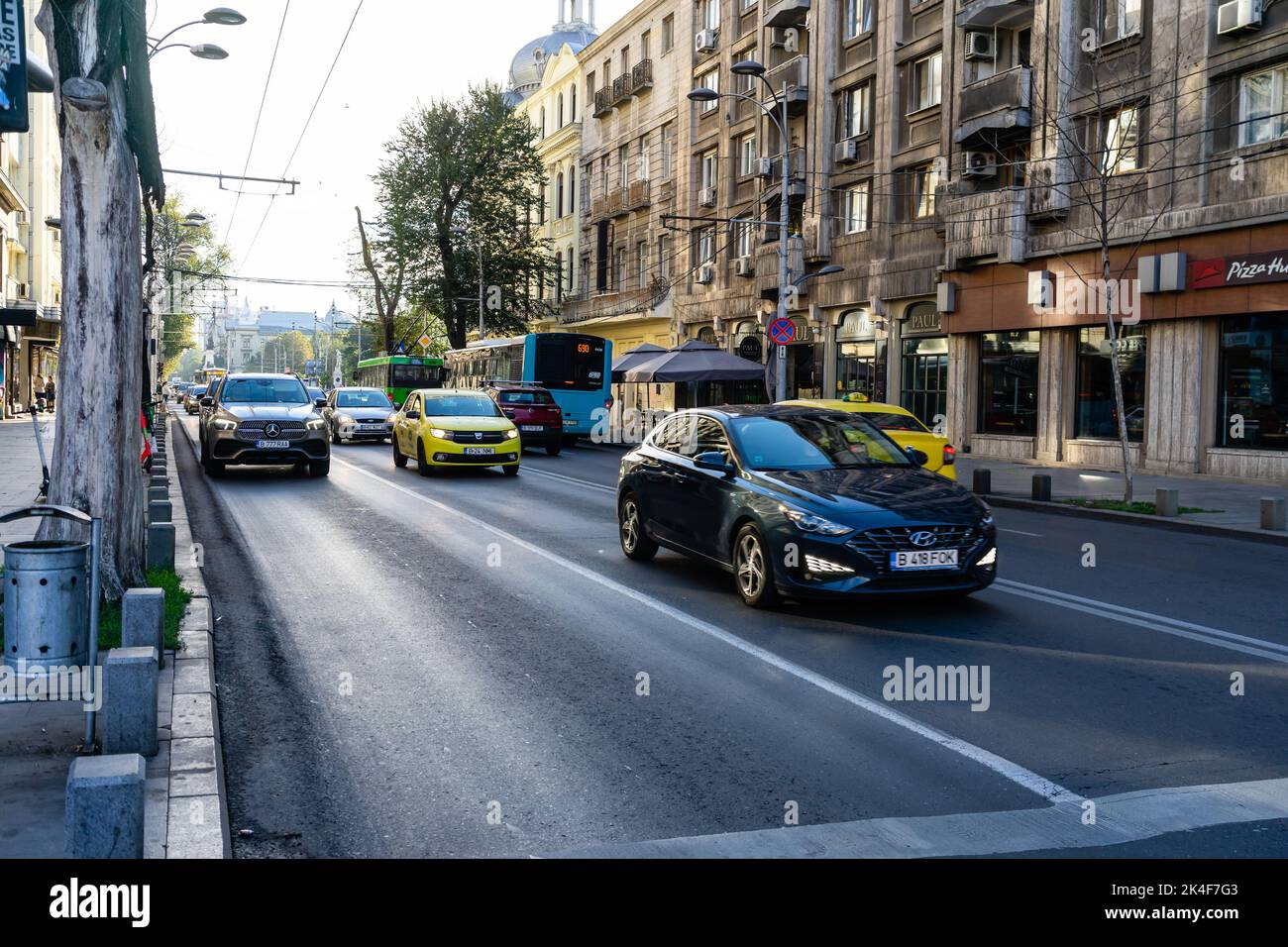 Car traffic at rush hour. Car pollution, traffic jam in Bucharest ...
