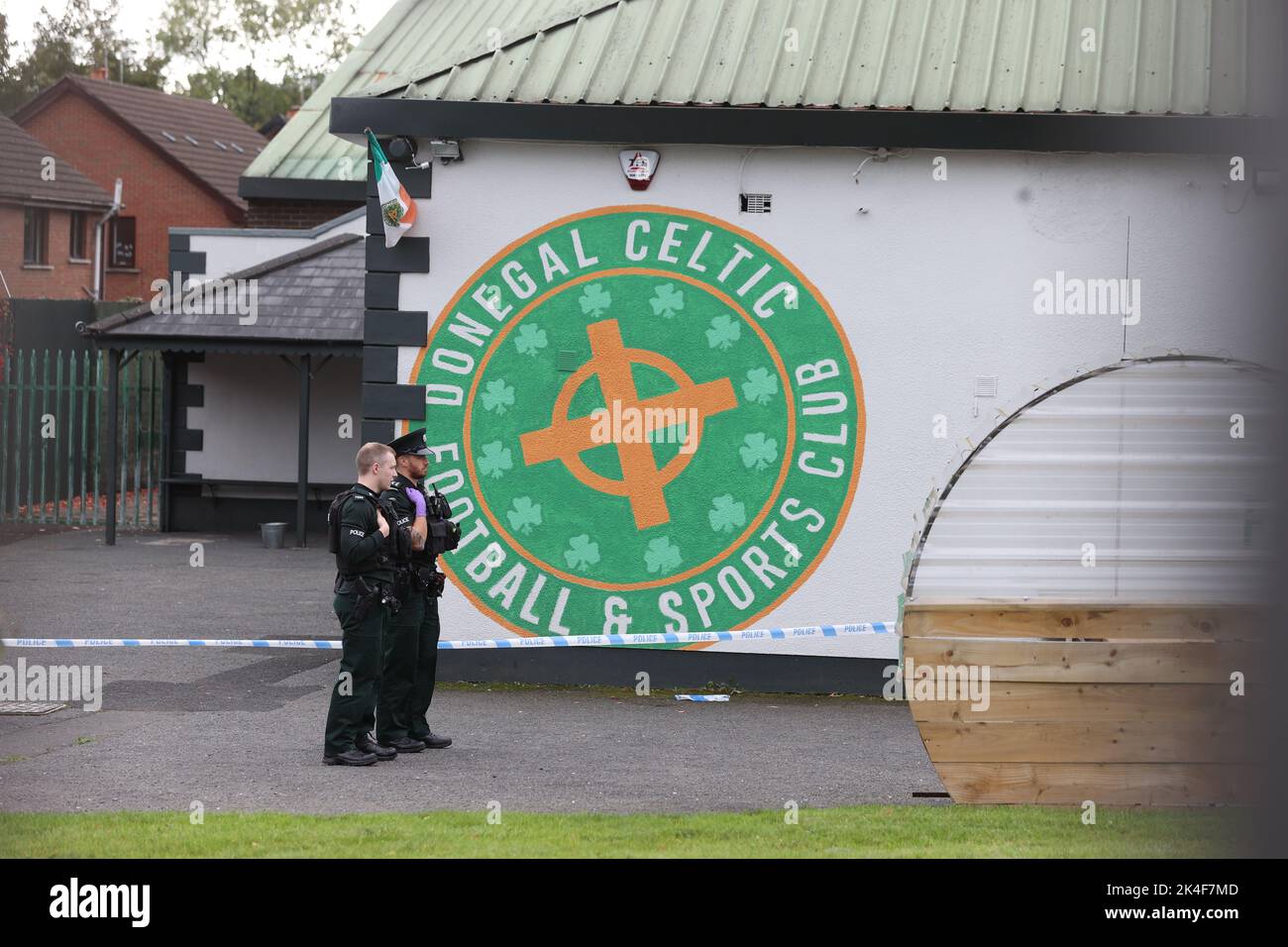Officers from the PSNI at the scene of a shooting at the clubhouse of ...
