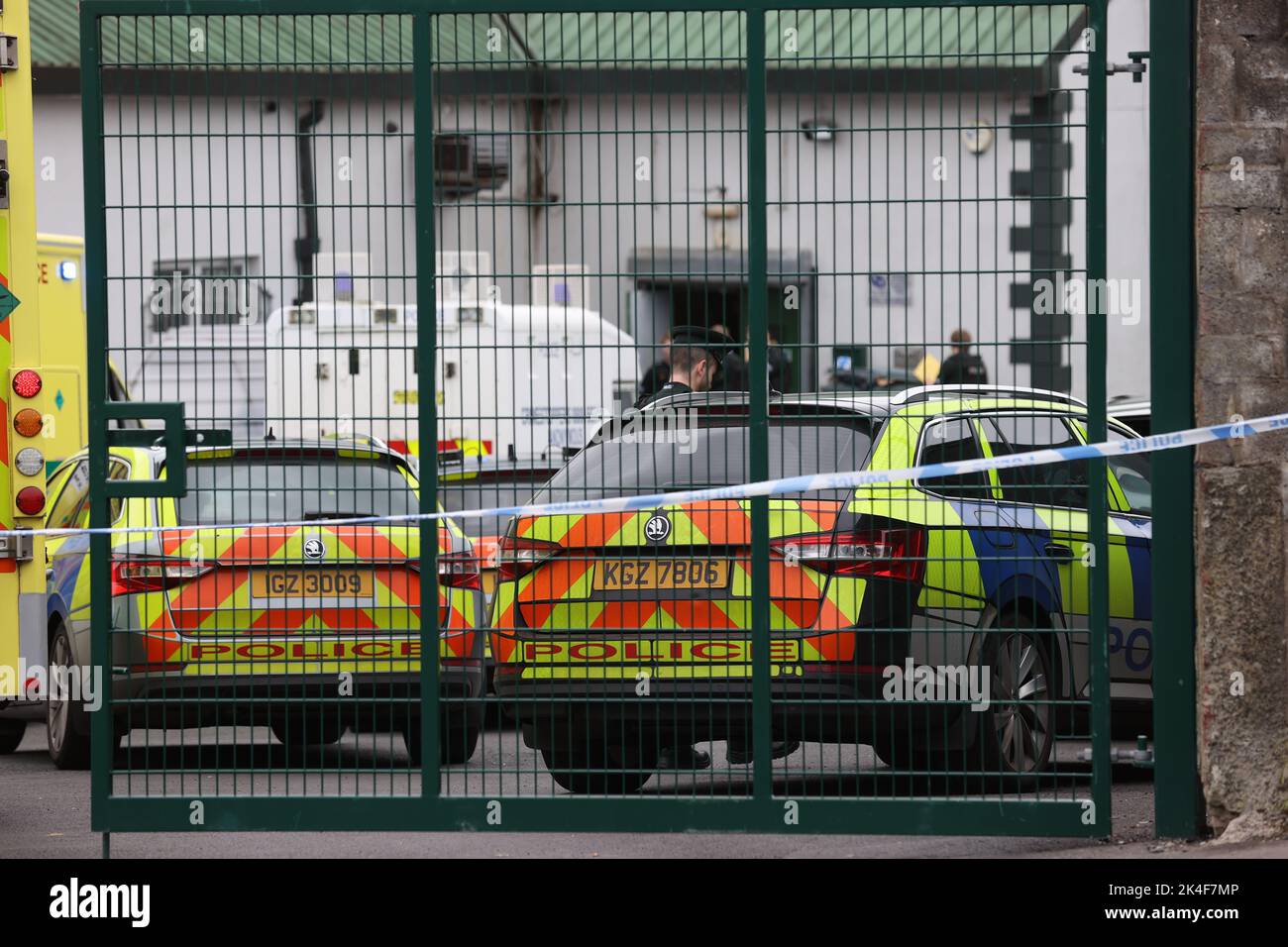 Officers from the PSNI at the scene of a shooting at the clubhouse of ...