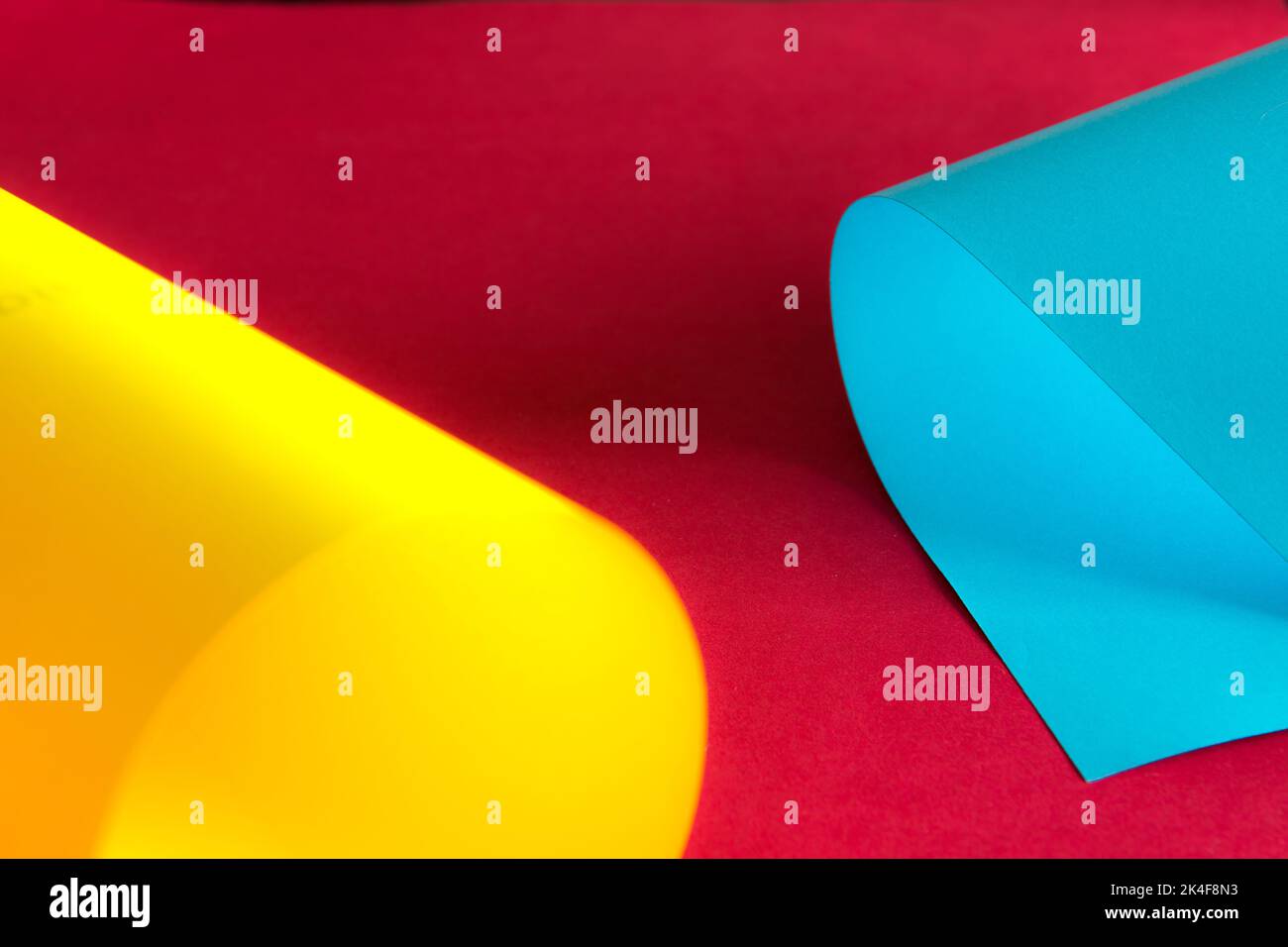 Red background with yellow and red arched shapes Stock Photo - Alamy