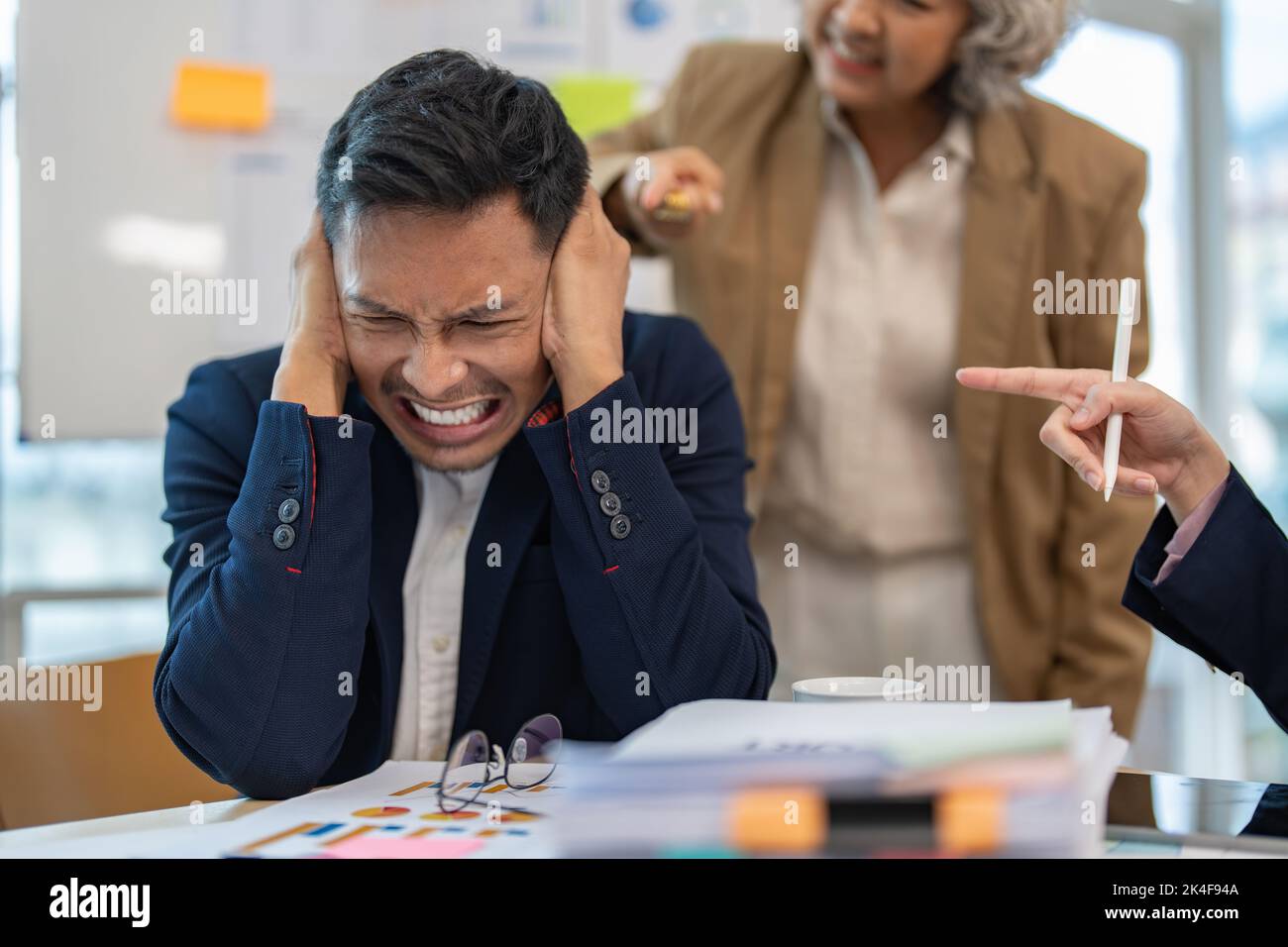 Stressed annoyed office employee having headache migraine at business finance meeting Stock ...