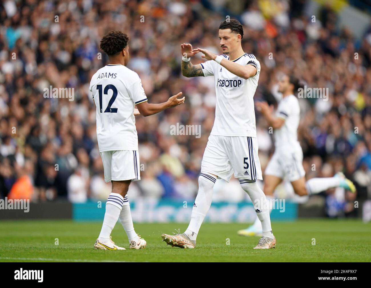 Leeds United's Tyler Adams greets Robin Koch ahead of the Premier ...