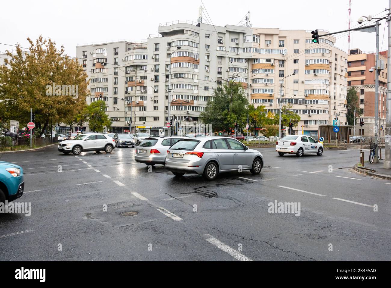 Car traffic at rush hour. Car pollution, traffic jam in Bucharest ...