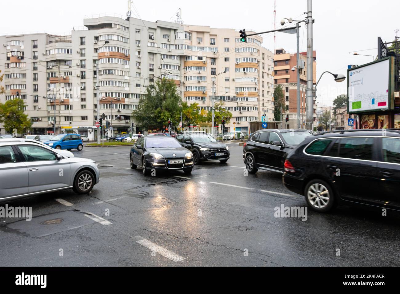 Car traffic at rush hour. Car pollution, traffic jam in Bucharest ...