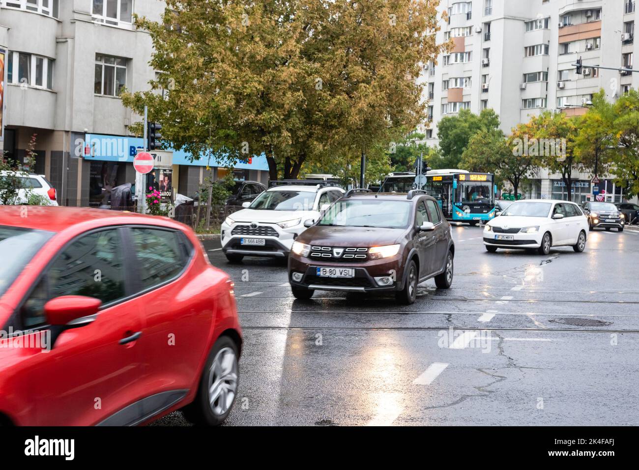 Car traffic at rush hour. Car pollution, traffic jam in Bucharest ...