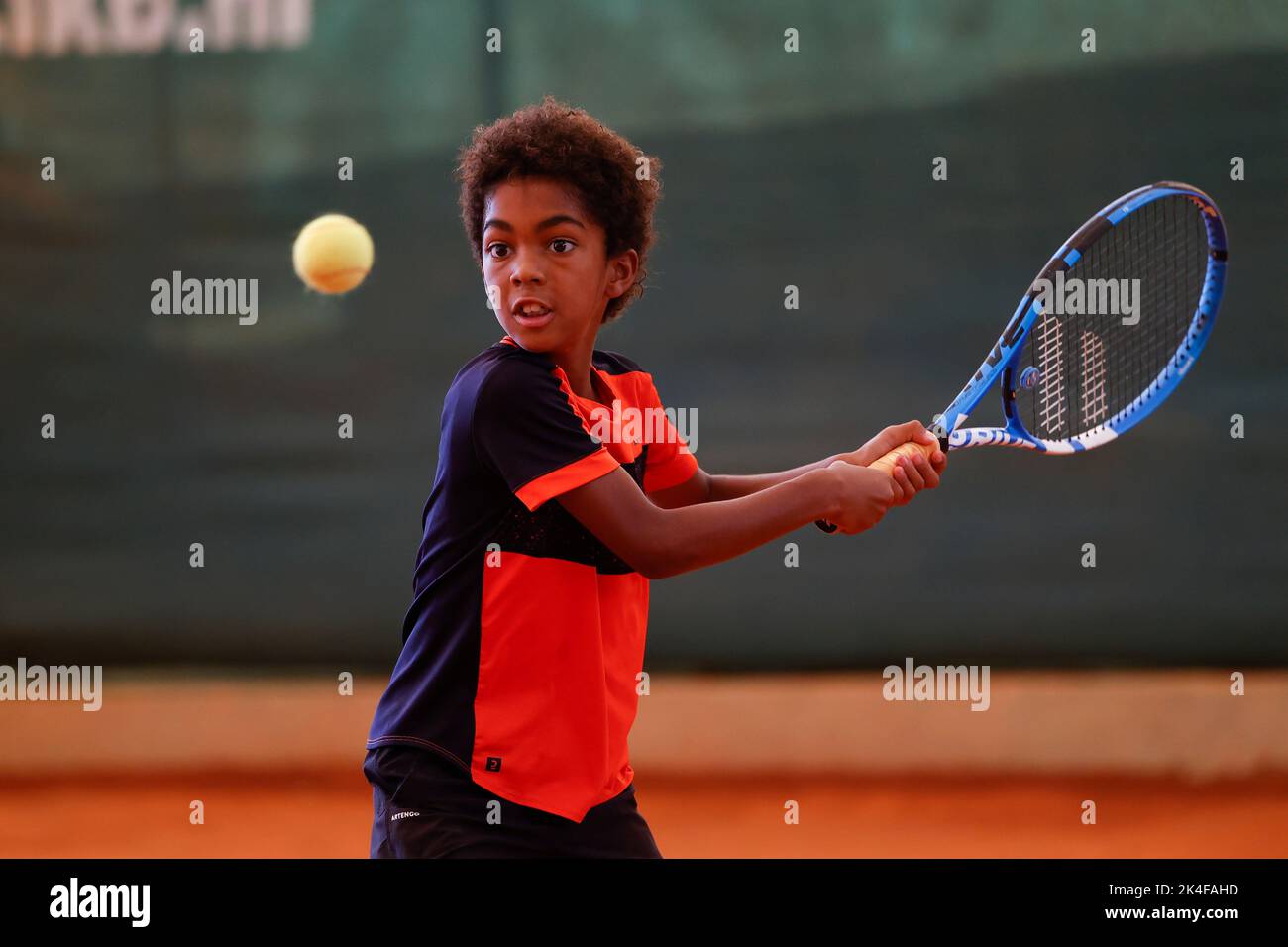 Young coloured boy playing tennis in Opatja, Croatia,Europe Stock Photo ...