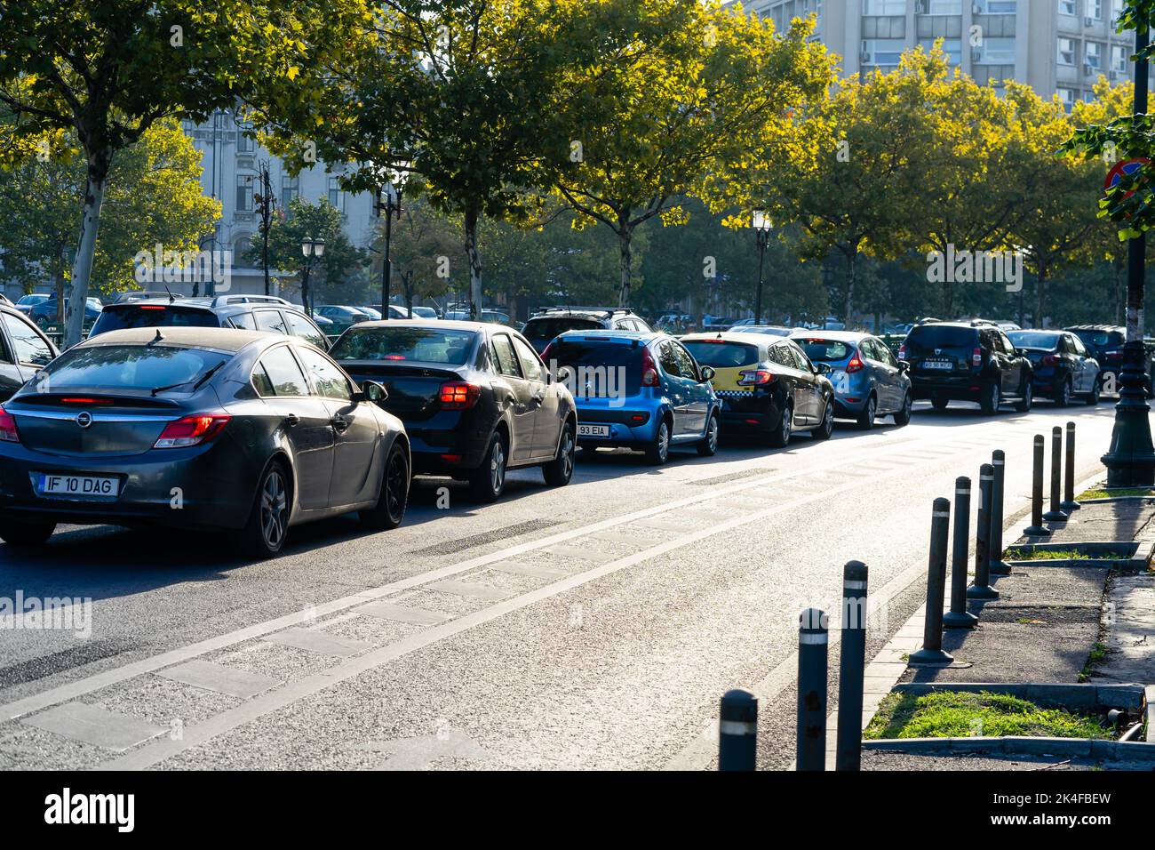 Car traffic at rush hour. Car pollution, traffic jam in Bucharest ...