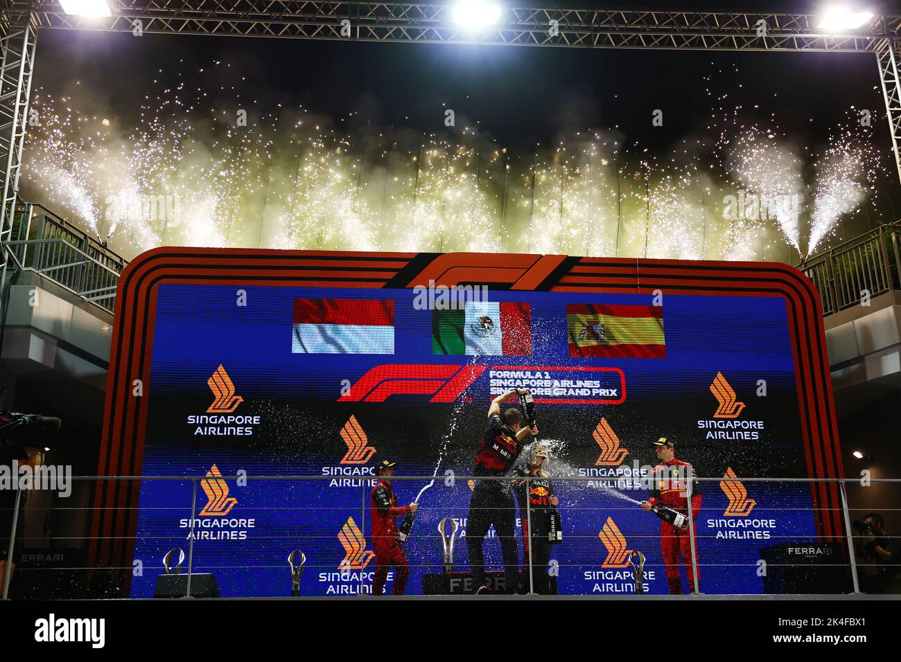 The podium (L to R): Charles Leclerc (MON) Ferrari, second; Hugh Bird ...