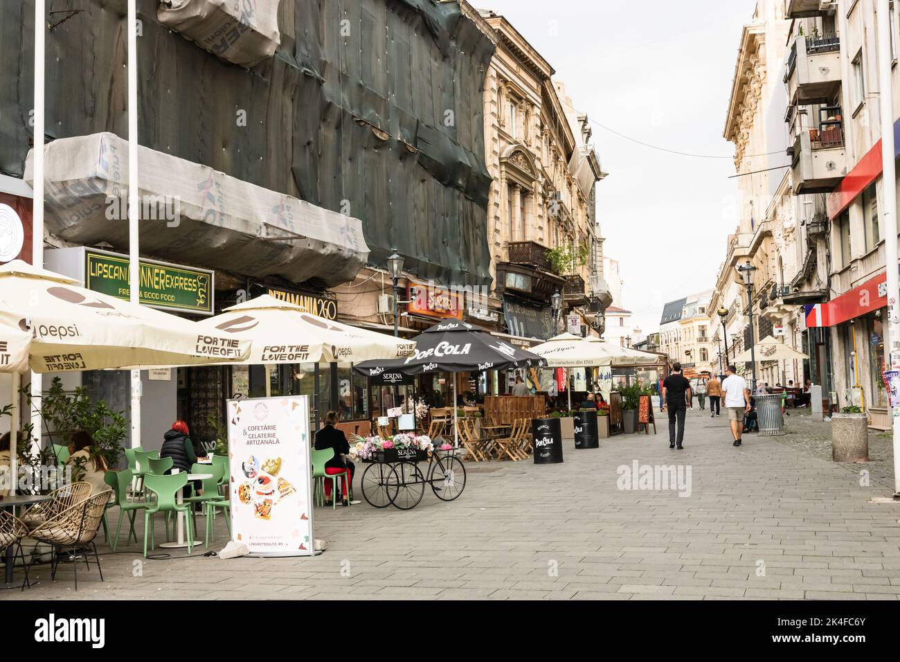 People and tourists walking in Bucharest Old Town, Romania, 2022 Stock ...