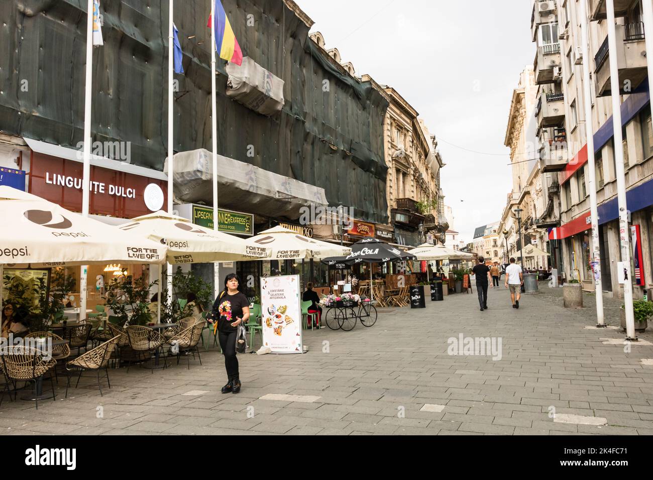 People and tourists walking in Bucharest Old Town, Romania, 2022 Stock ...