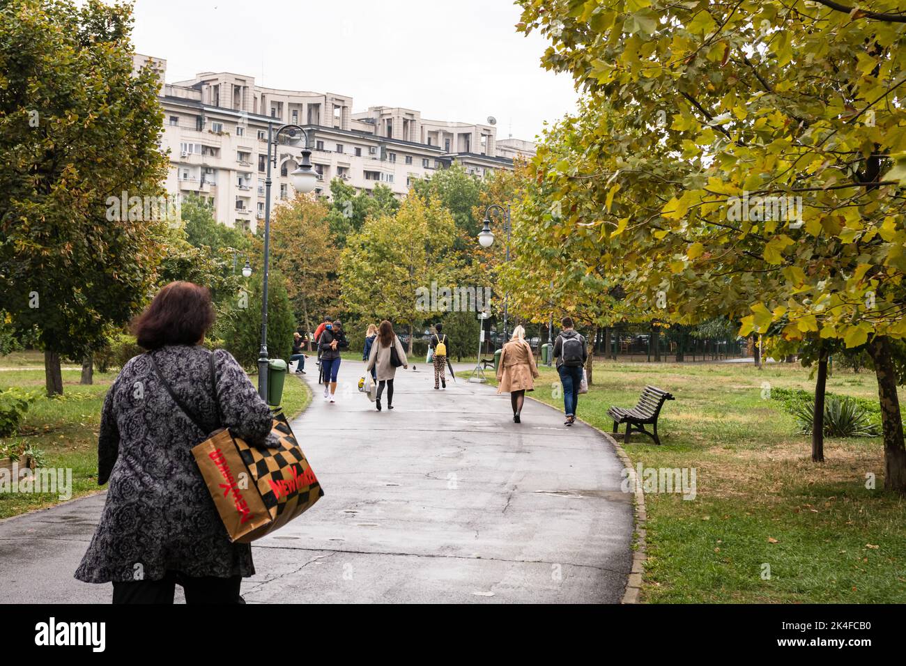 People and tourist wander in the park. Bucharest, Romania, 2022 Stock ...