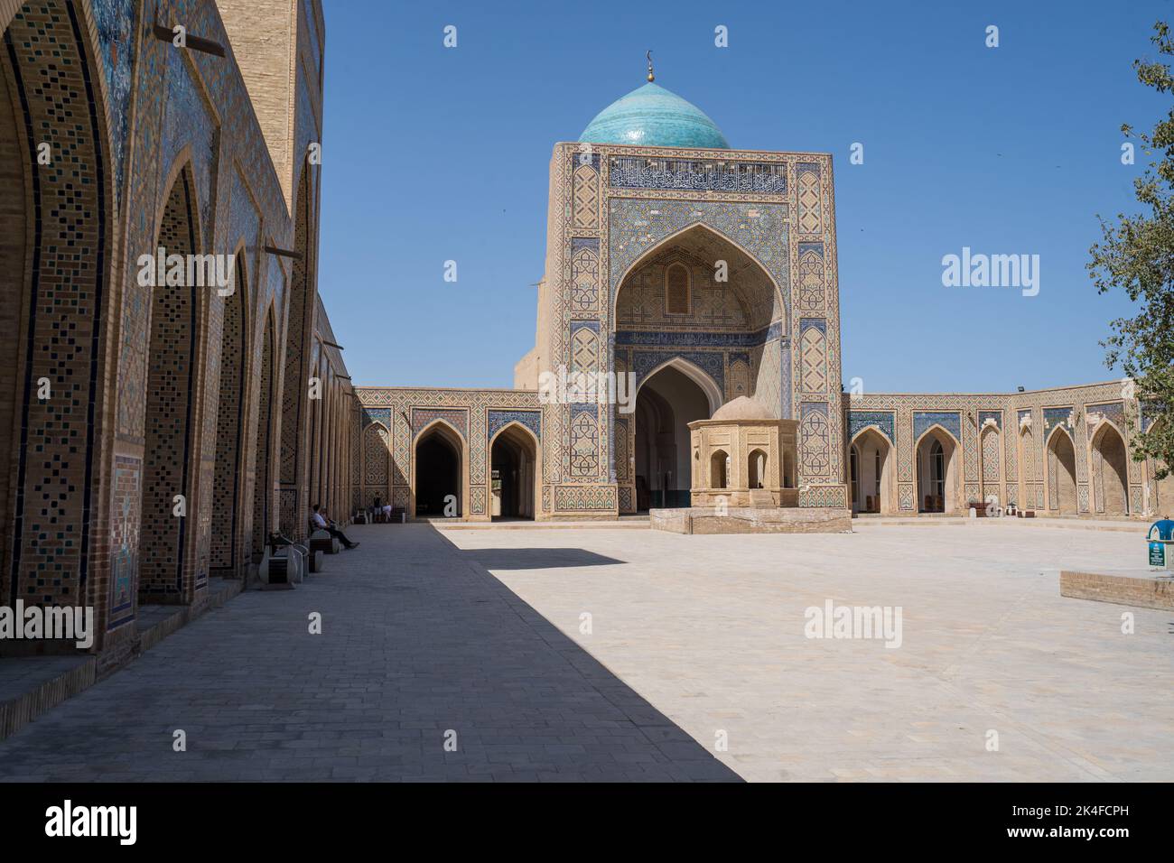 Kalan Mosque courtyard and blue-tiled dome, Bukhara Old Town Stock ...