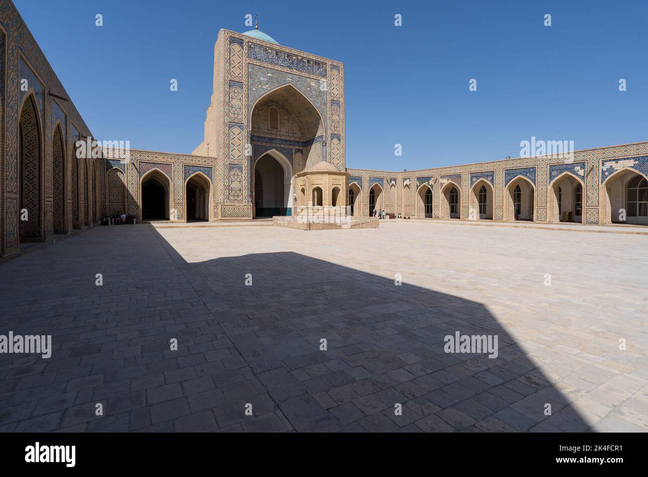 Kalan Mosque courtyard and blue-tiled dome, Bukhara Old Town Stock ...