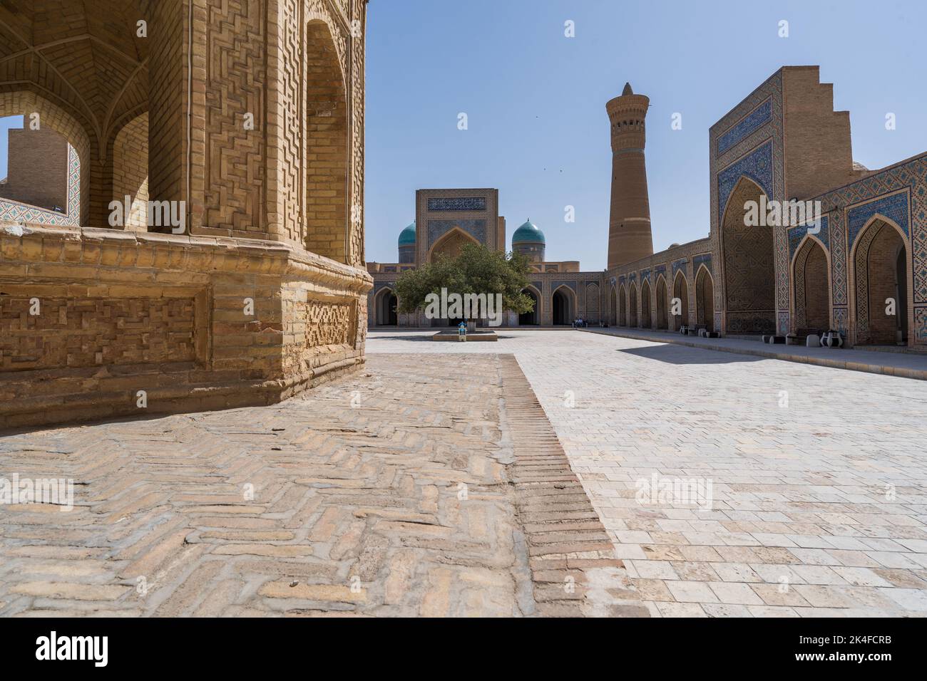 Kalan Mosque courtyard and blue-tiled dome, Bukhara Old Town Stock ...