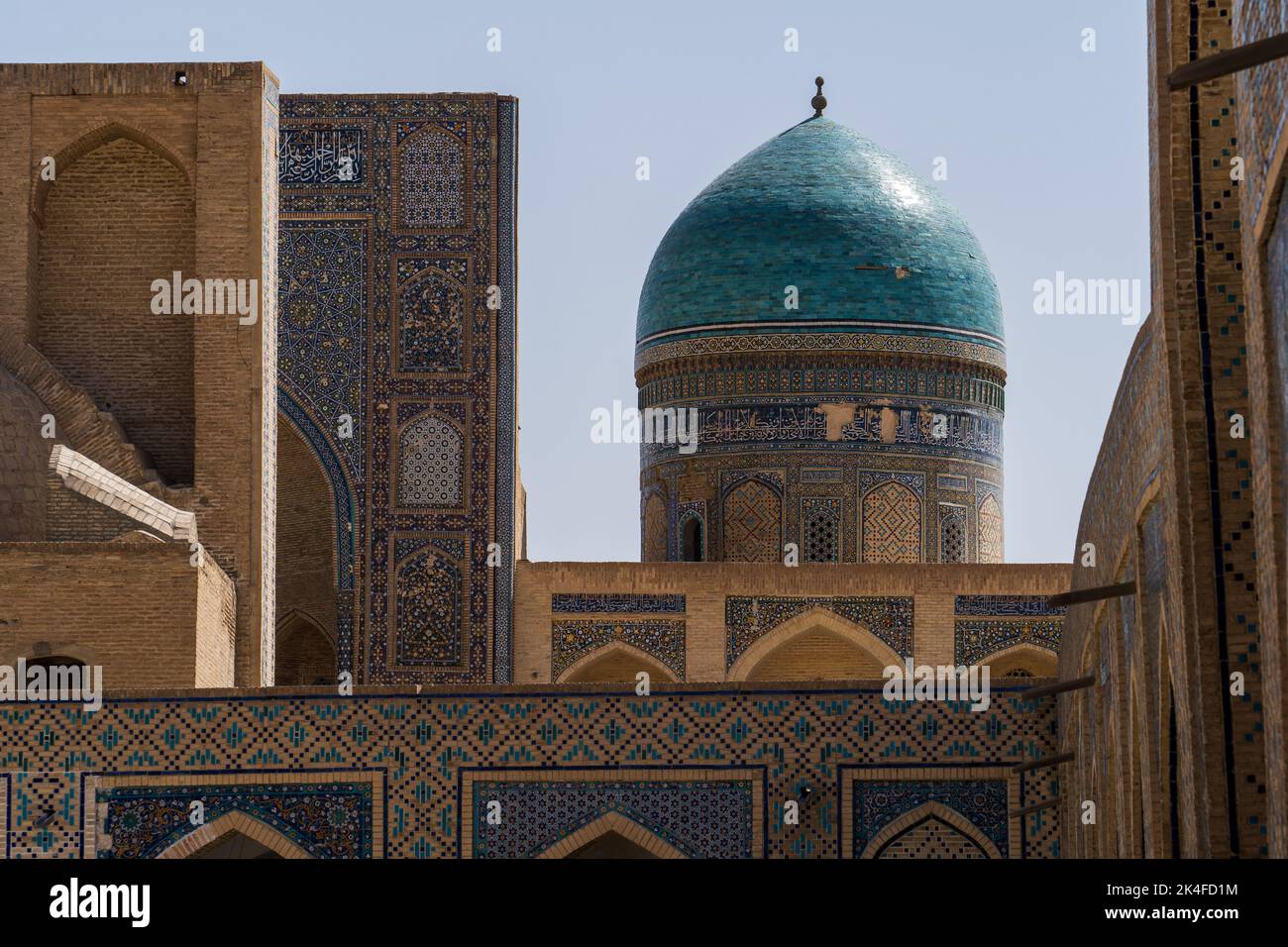 Zoom of Mir-i-Arab madrassa blue-tiled dome from courtyard of Kalan ...