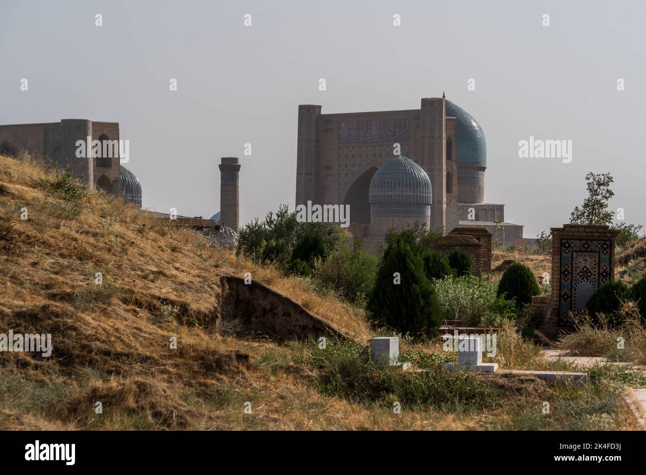 Bibi-Khanym Mosque shot from Afrasiyab cemetery at sunset Stock Photo ...