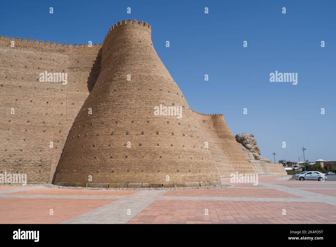 Wavy flowing walls of the Bukhara Ark castle fortress Stock Photo - Alamy