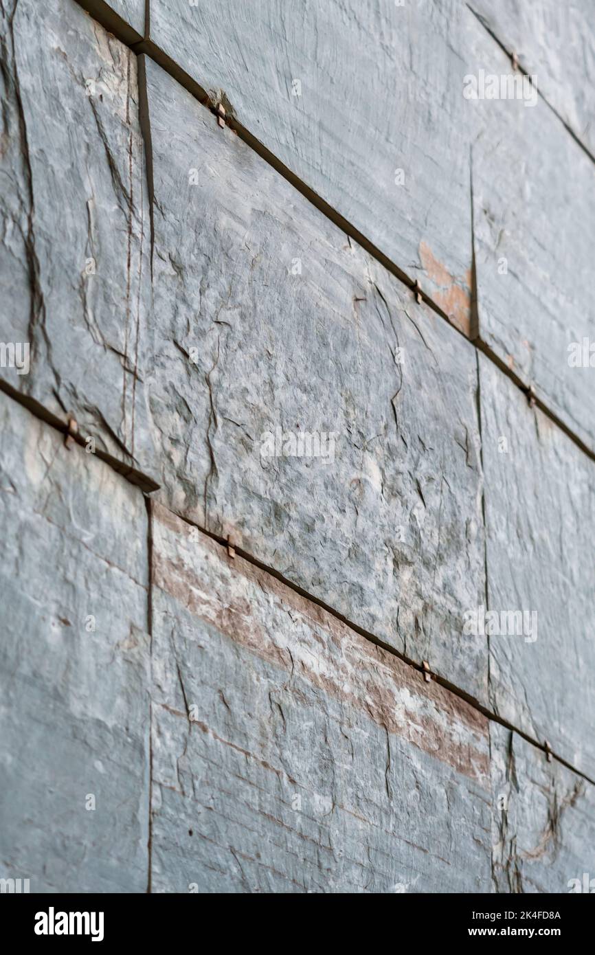 Facade rough cracked tiles made of graphite slate natural stone with ...