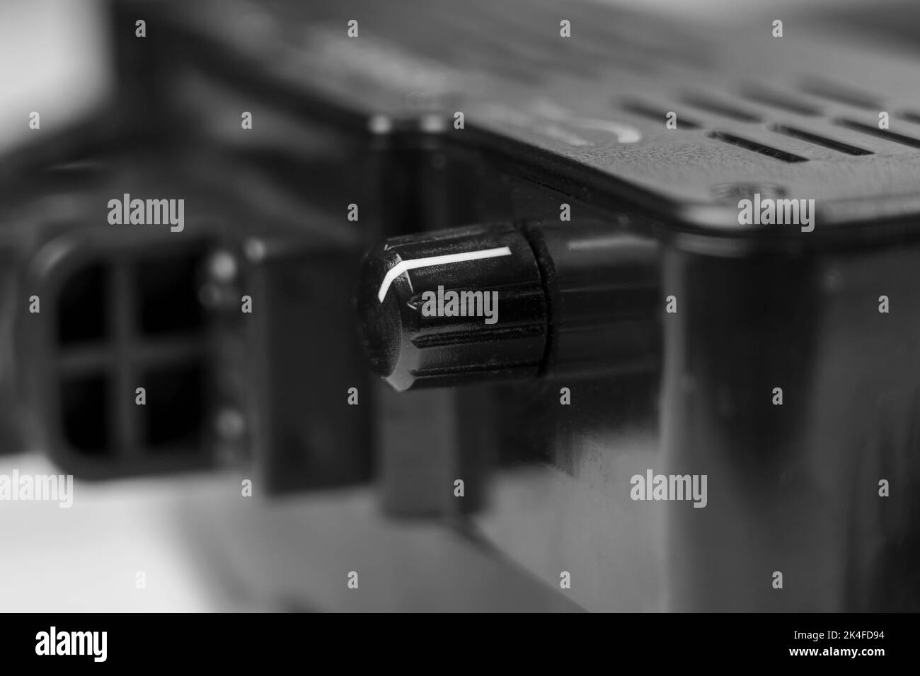 Black electrical appliance with adjusting turning knob close up Stock ...