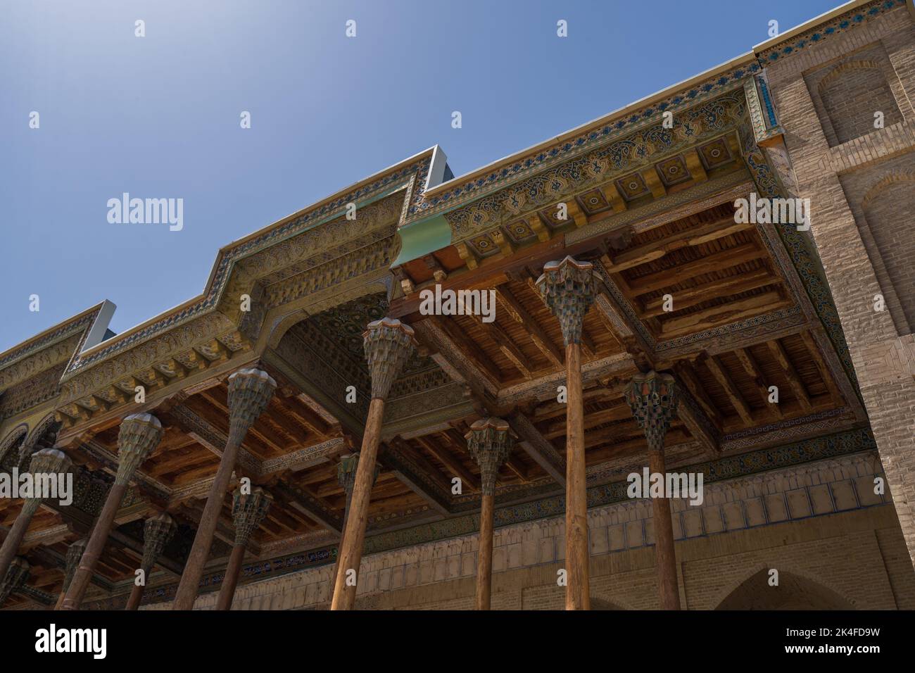 Wooden carved structures of mosque in Bukhara Ark Stock Photo - Alamy