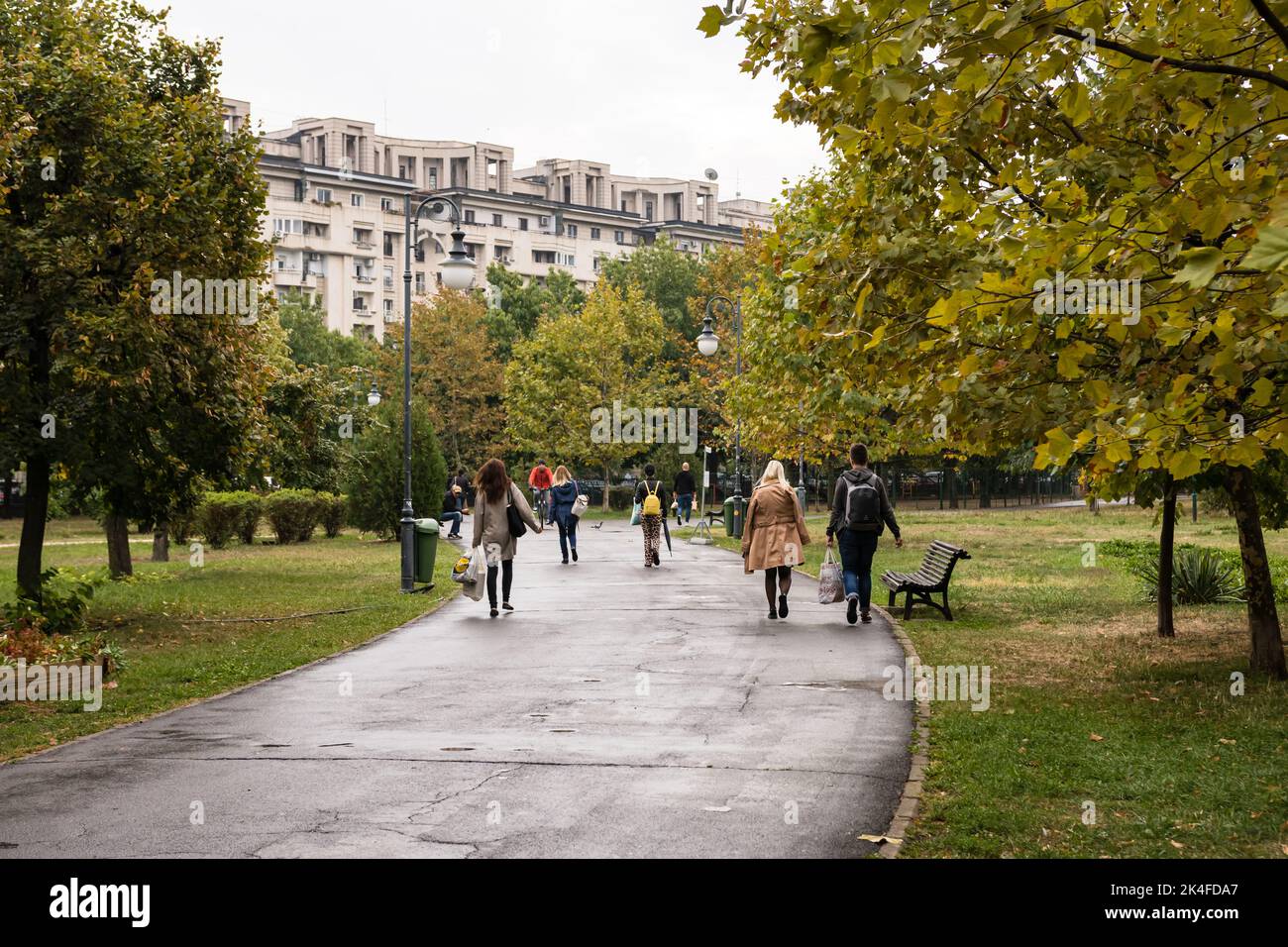 People and tourist wander in the park. Bucharest, Romania, 2022 Stock ...