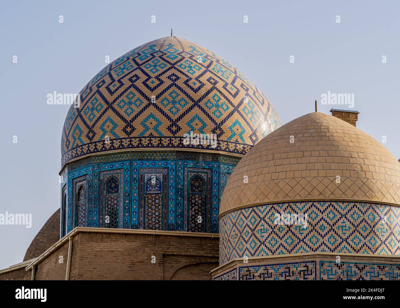 Zoom of patterns and textures of the golden and blue tiled domes in ...