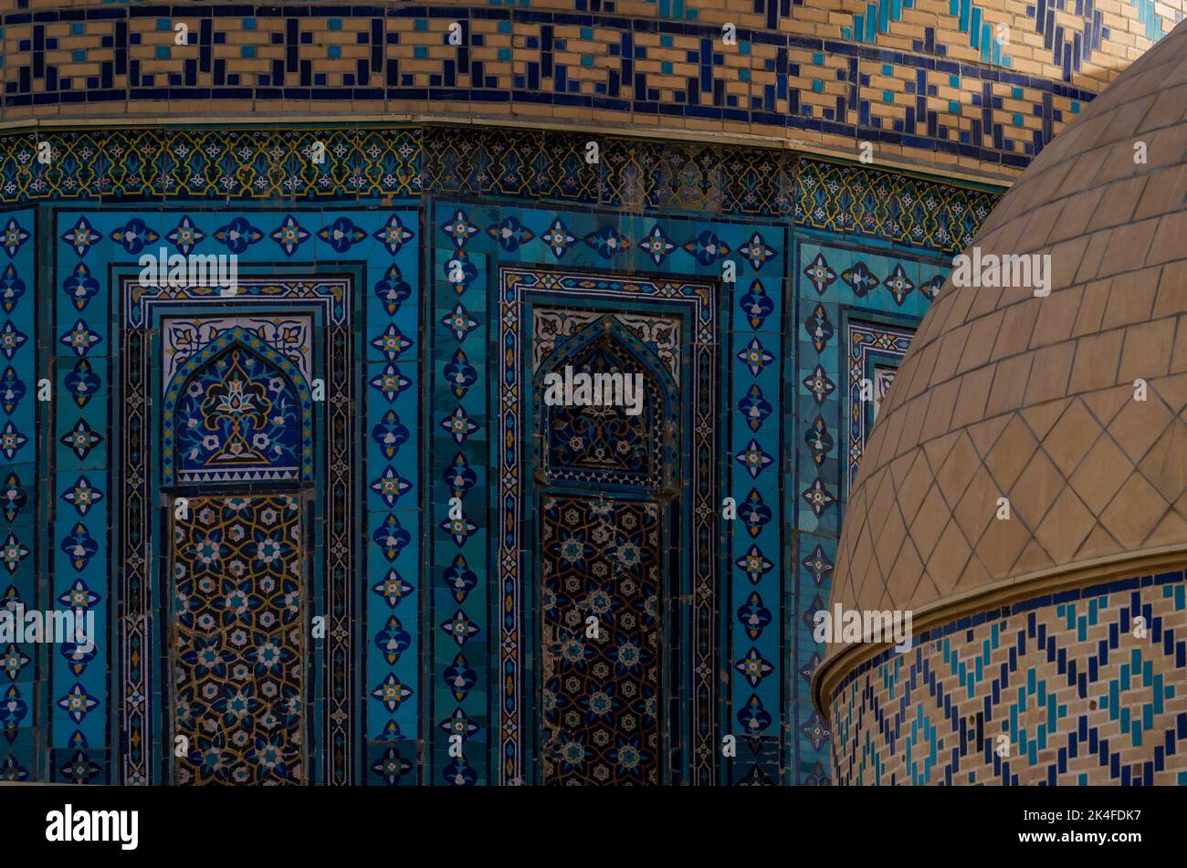 Zoom of patterns and textures of the golden and blue tiled domes in ...