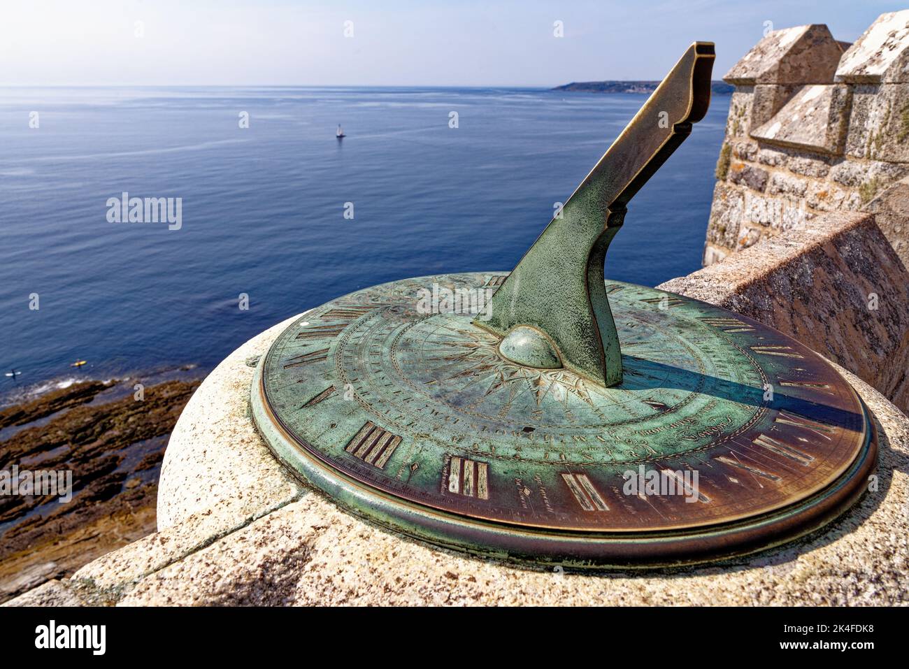 Ancient sundial on the castle walls of Saint Michael's Mount against ...