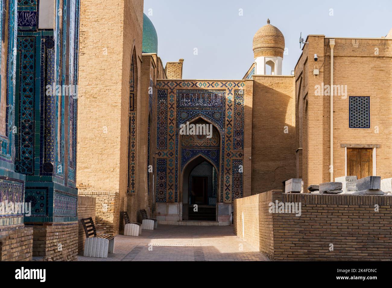 Blue tiled facades and arches of the Shah-i-Zinda mausoleum complex at ...