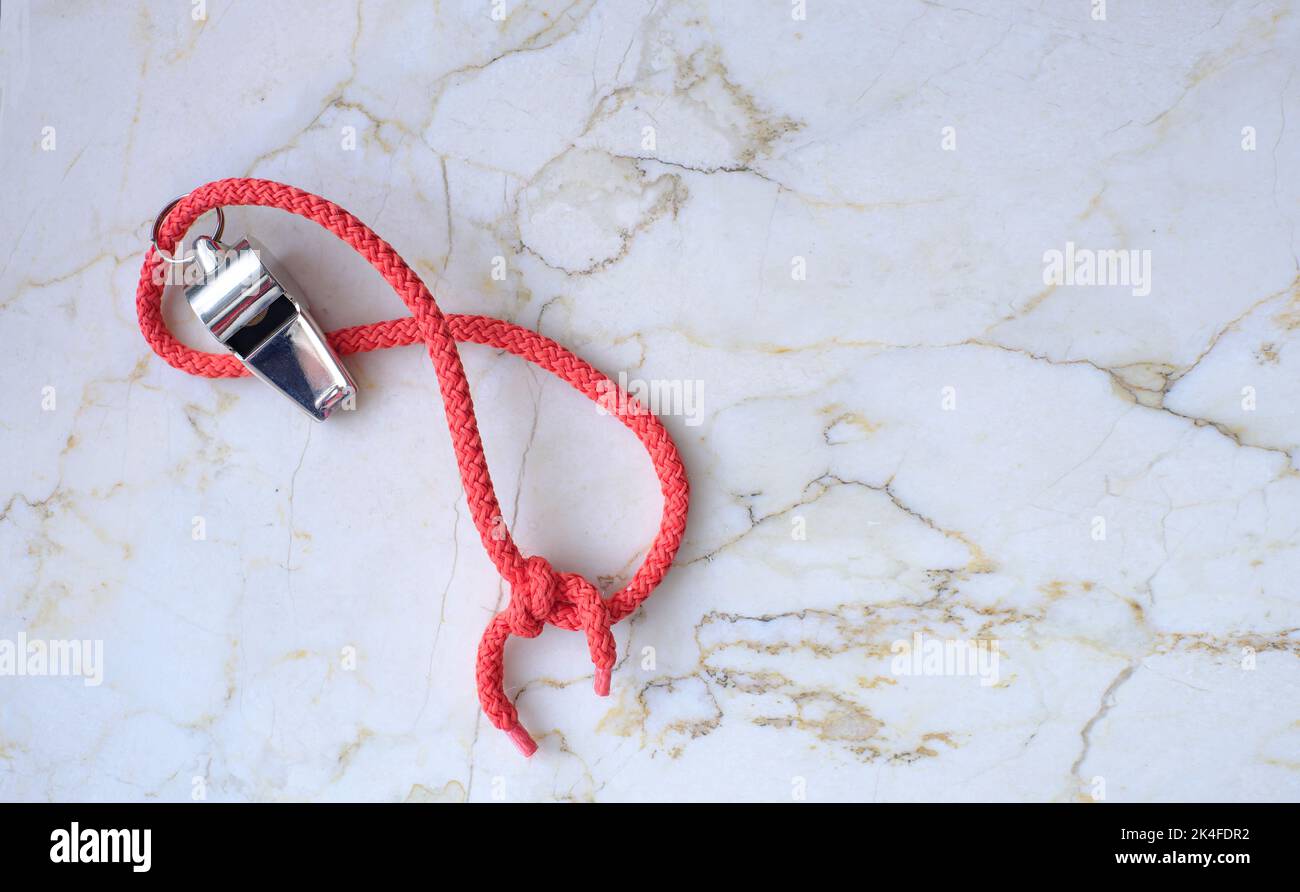 Whistle of soccer referee or coach flat lay on marble background. Great ...