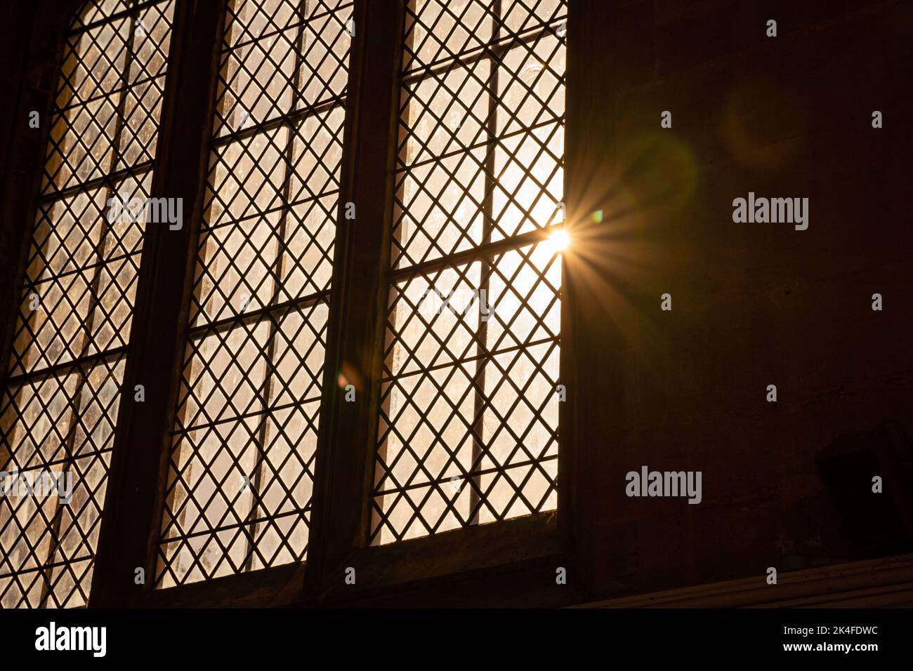 Stain glass window, sunlight shining through Stock Photo - Alamy
