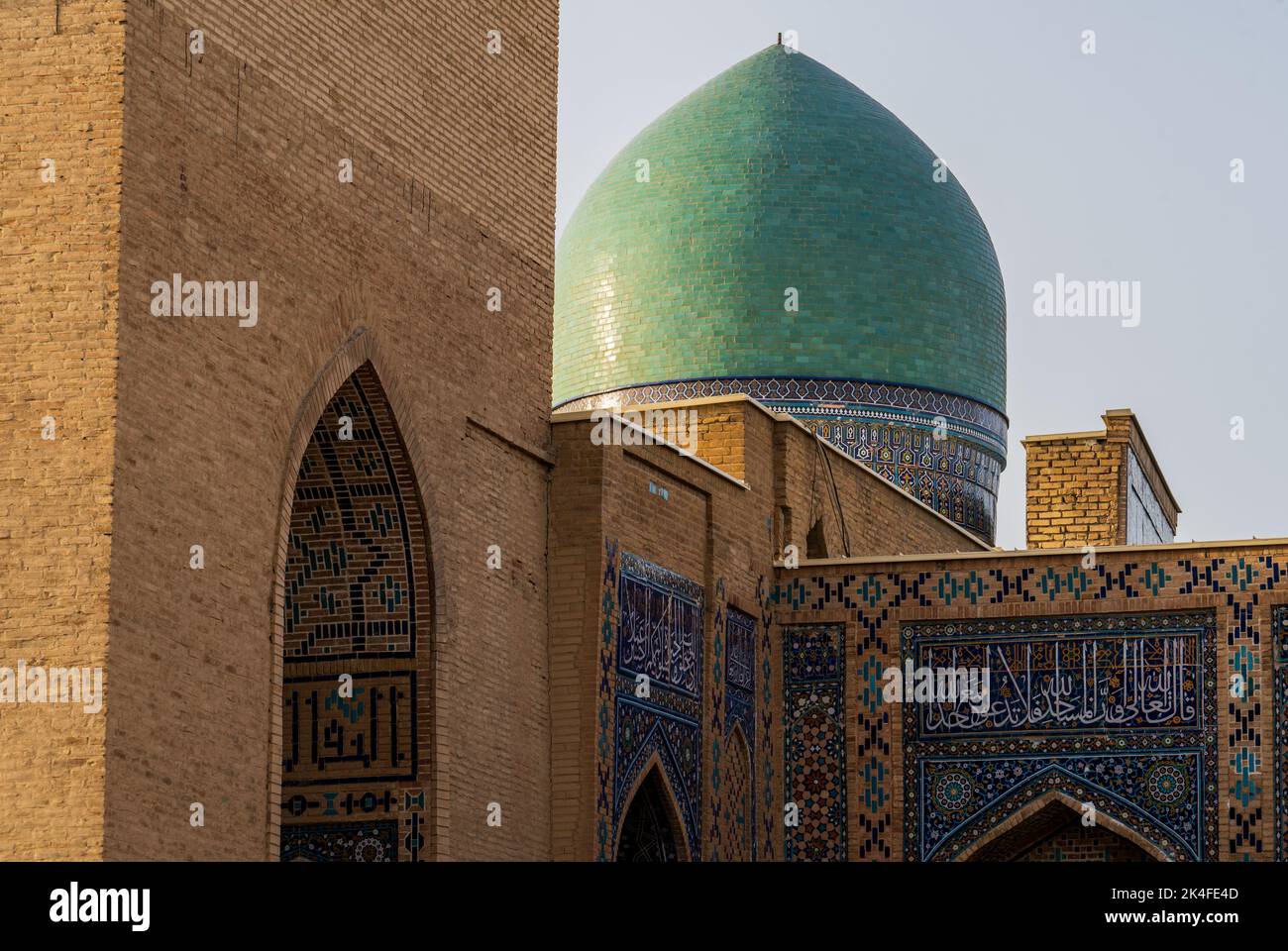 Green emerald dome and blue tiles of the Shah-i-Zinda mausoleum complex ...