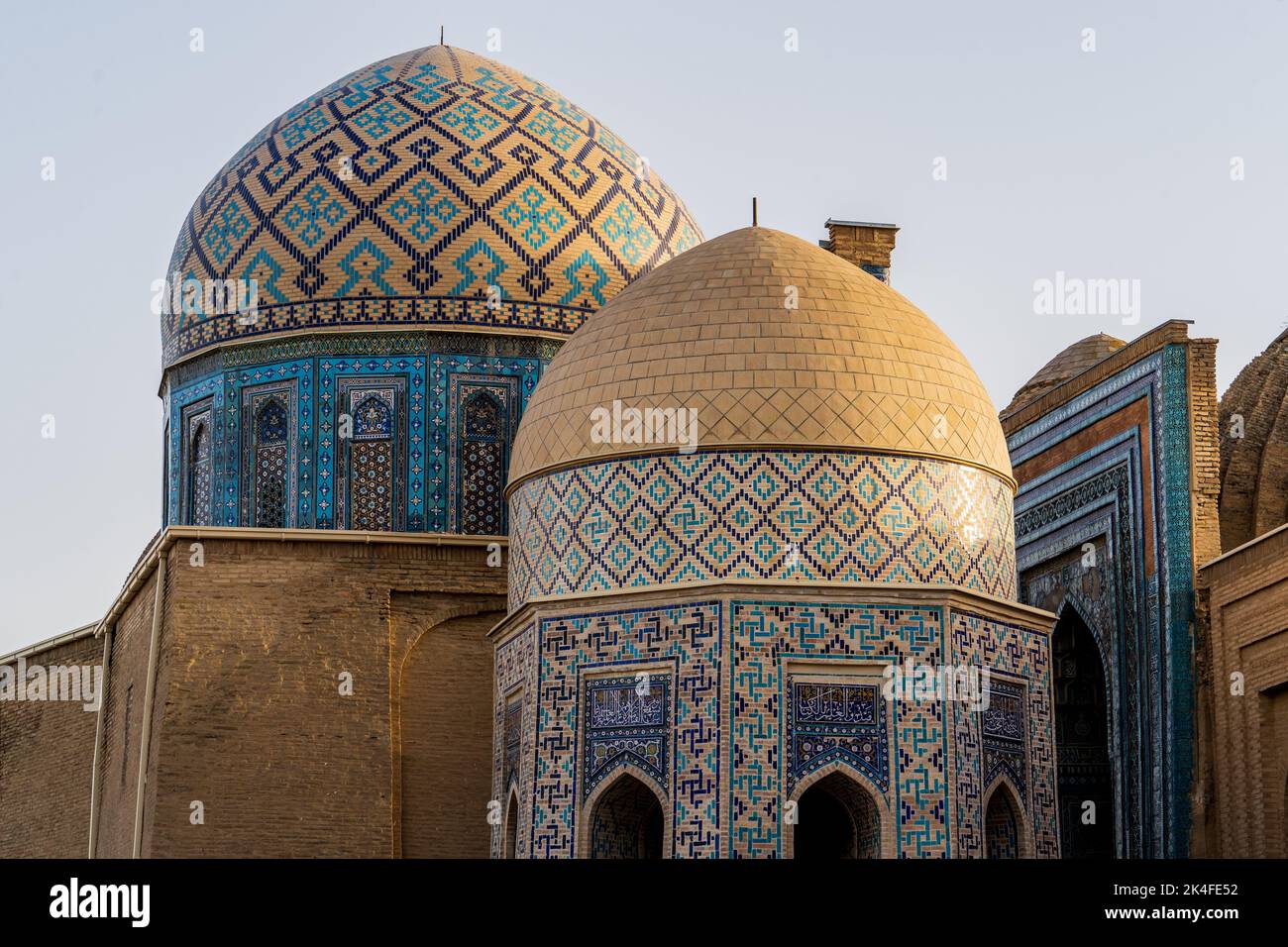 Zoom of patterns and textures of the golden and blue tiled domes in ...