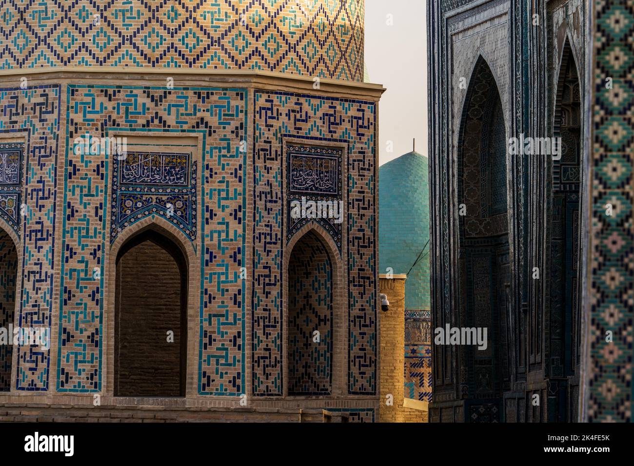 Zoom of patterns and textures of the golden and blue tiled domes in ...