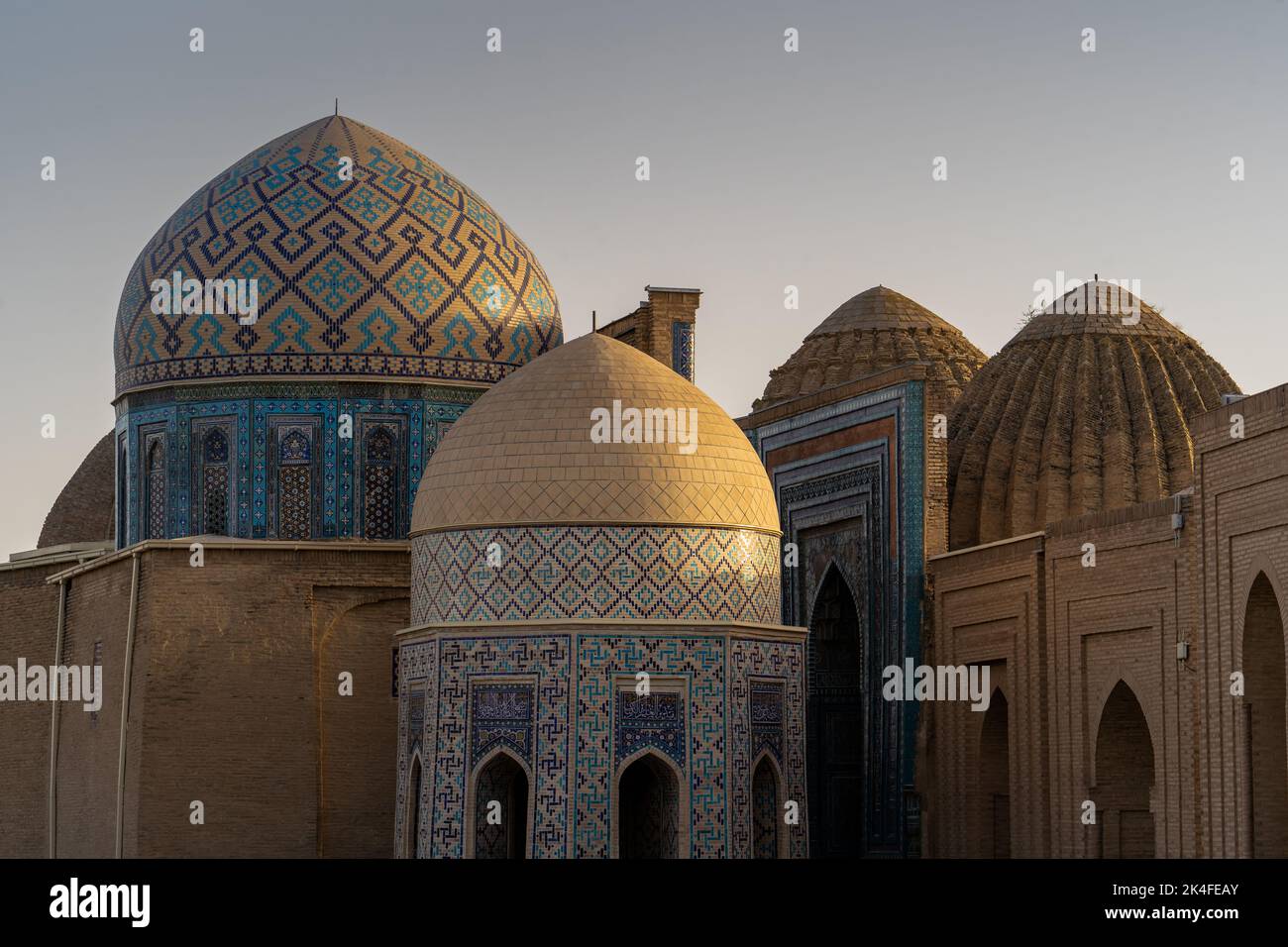 Zoom of patterns and textures of the golden and blue tiled domes in ...