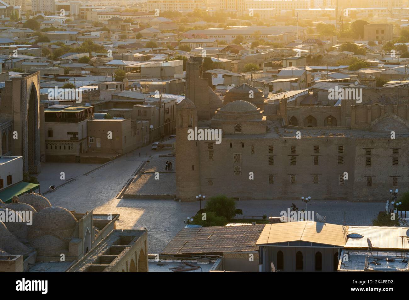 Mosques and Madrasas, historical buildings in Bukhara old town aerial ...