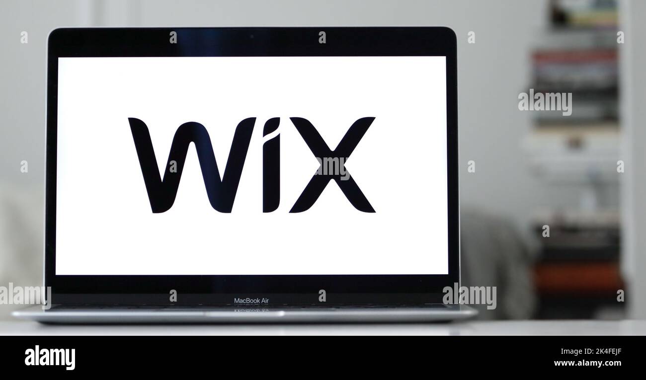 The logo of the Wix software company visible on a laptop computer on a ...