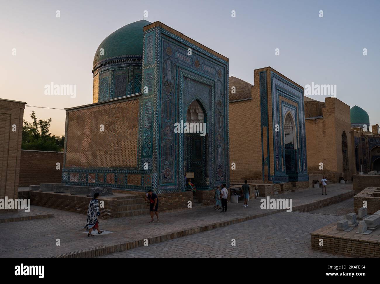 The blue tiled facades domes and arches of the Shah-i-Zinda mausoleum ...