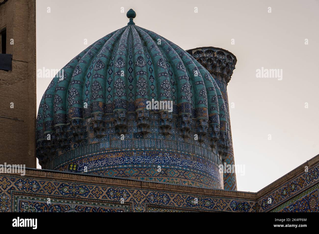 Sherdor Madrassa in Registan Complex at sunset with beautiful blue ...