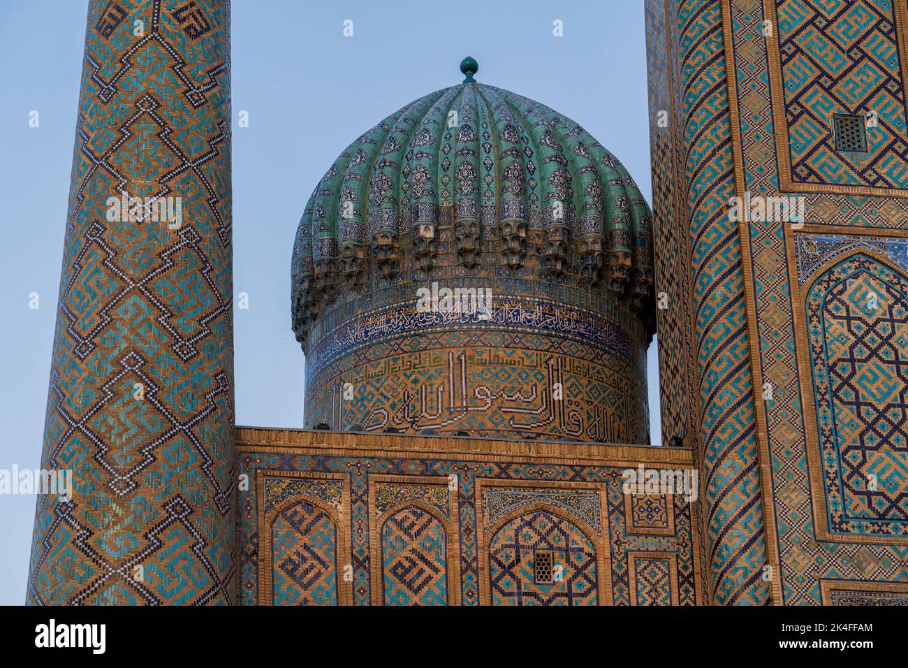 Sherdor Madrassa in Registan Complex at sunset with beautiful blue ...